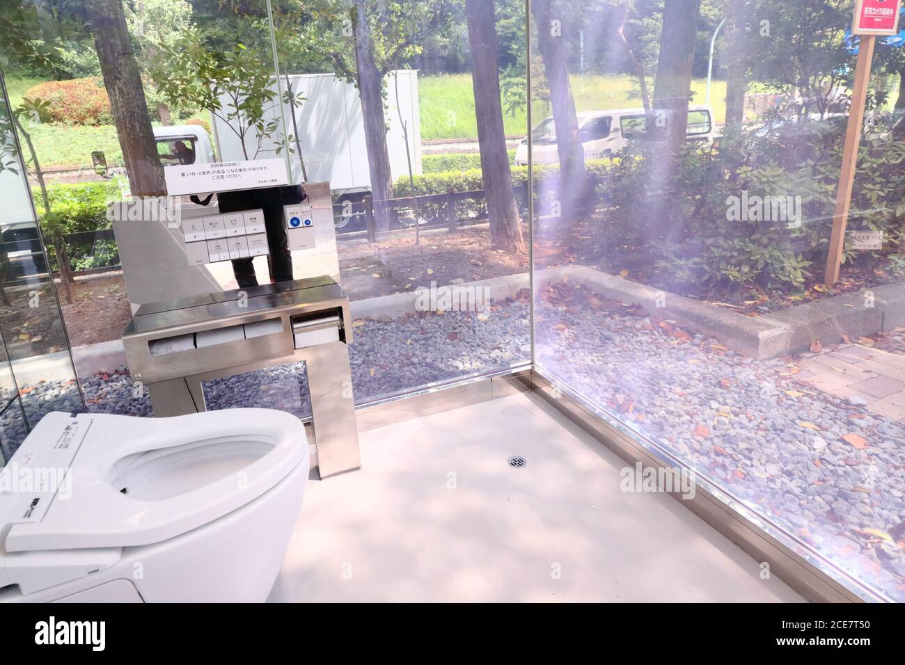 A general view of a transparent public toilet designed by Shigeru Ban ...