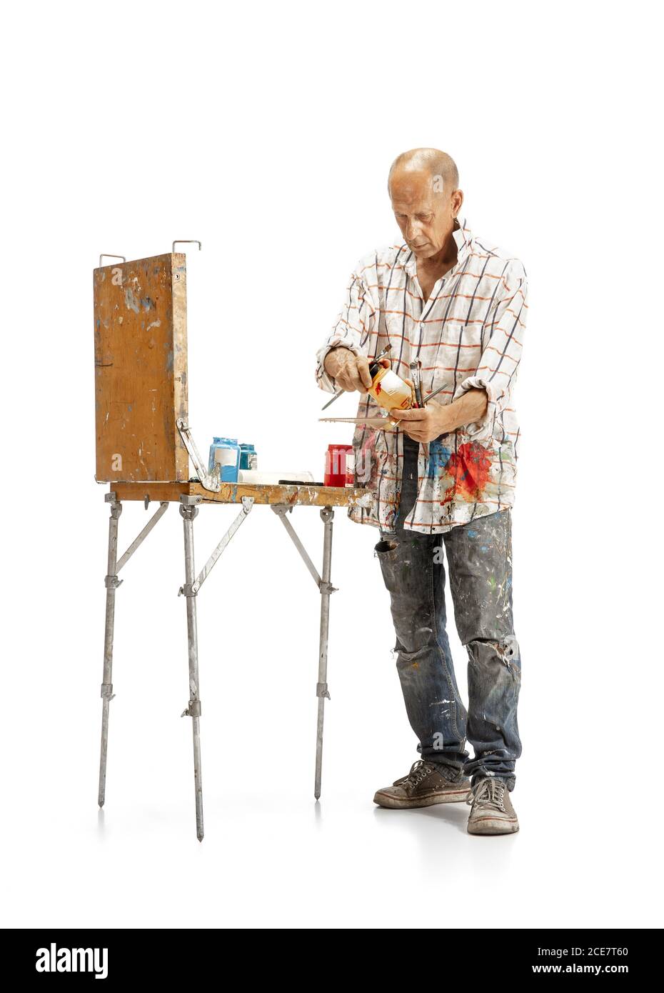 Male caucasian artist, painter at work isolated on white studio ...