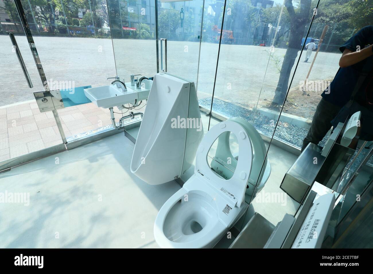 A general view of a transparent public toilet designed by Shigeru Ban ...