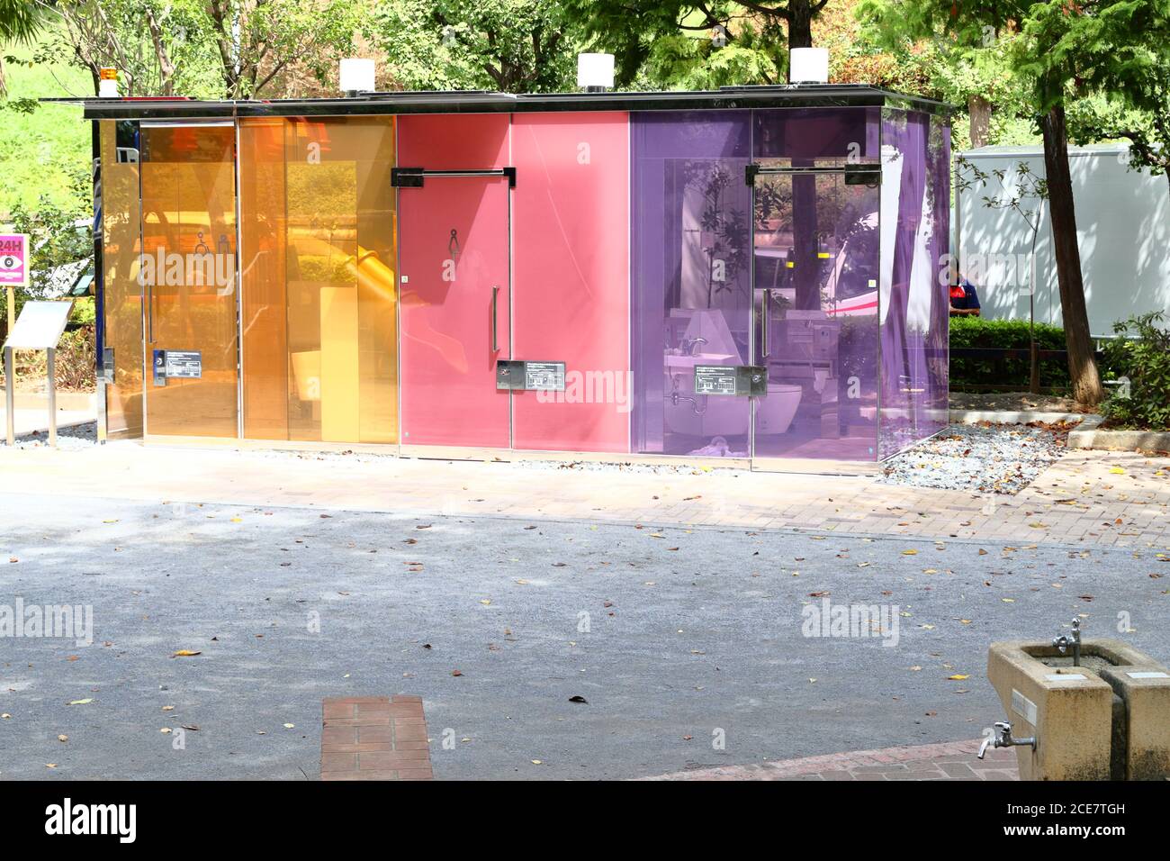 A general view of a transparent public toilet designed by Shigeru Ban ...