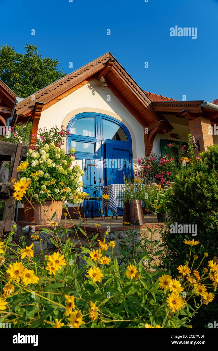 Colorful house entrance in Pecs Hungary with many flowers Stock Photo ...
