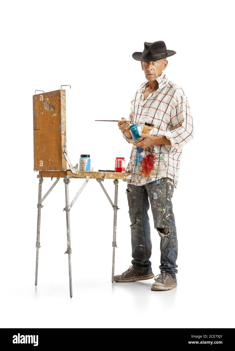 Male caucasian artist, painter at work isolated on white studio ...
