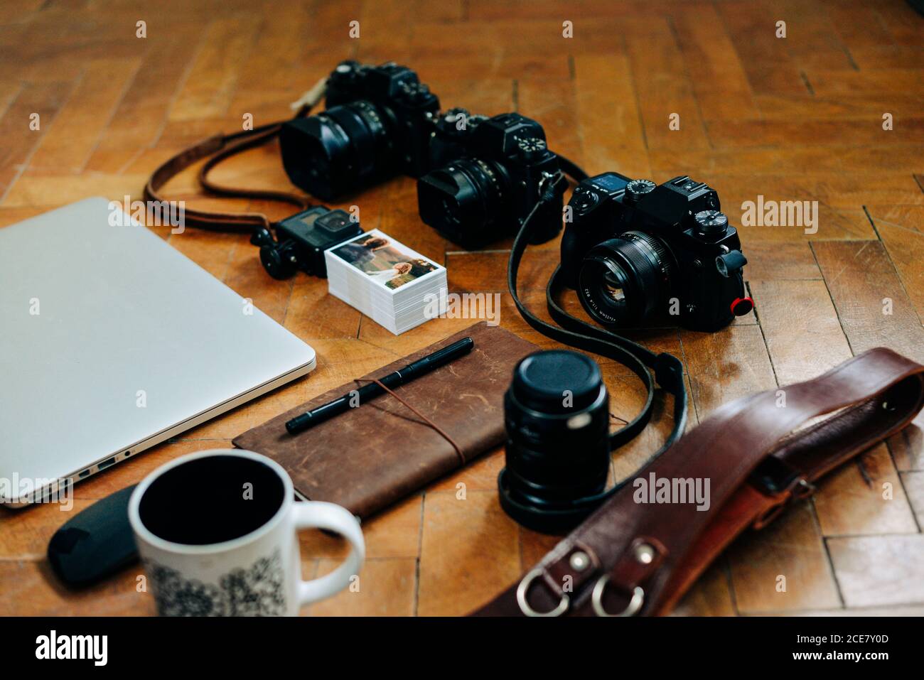 Flat lay of assorted photography devices and gear placed on shabby ...