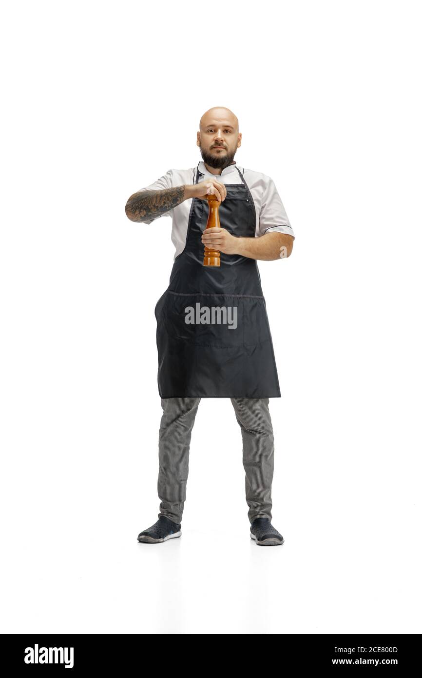 Portrait of a male chef cook, butcher isolated on a white studio ...