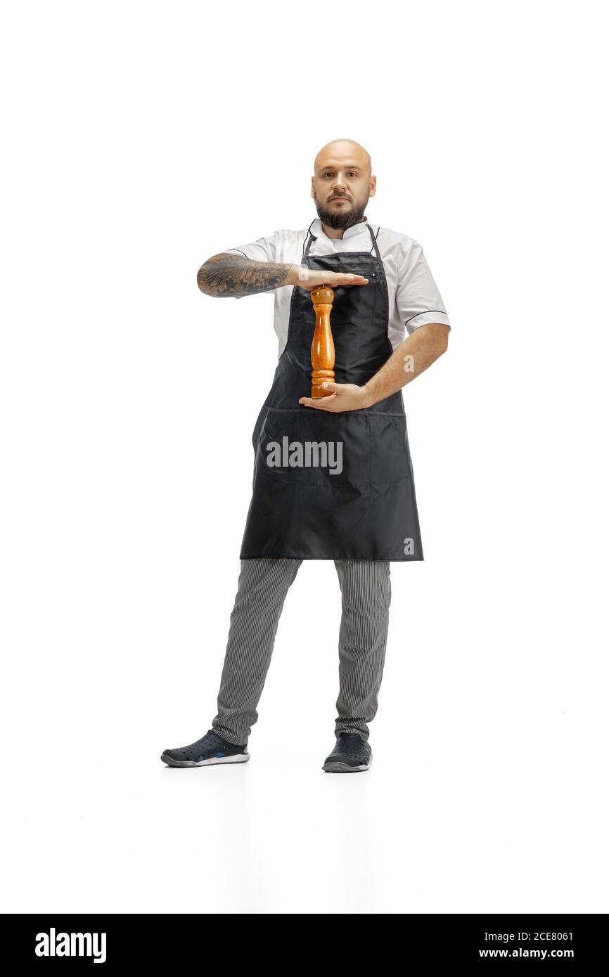 Portrait of a male chef cook, butcher isolated on a white studio ...