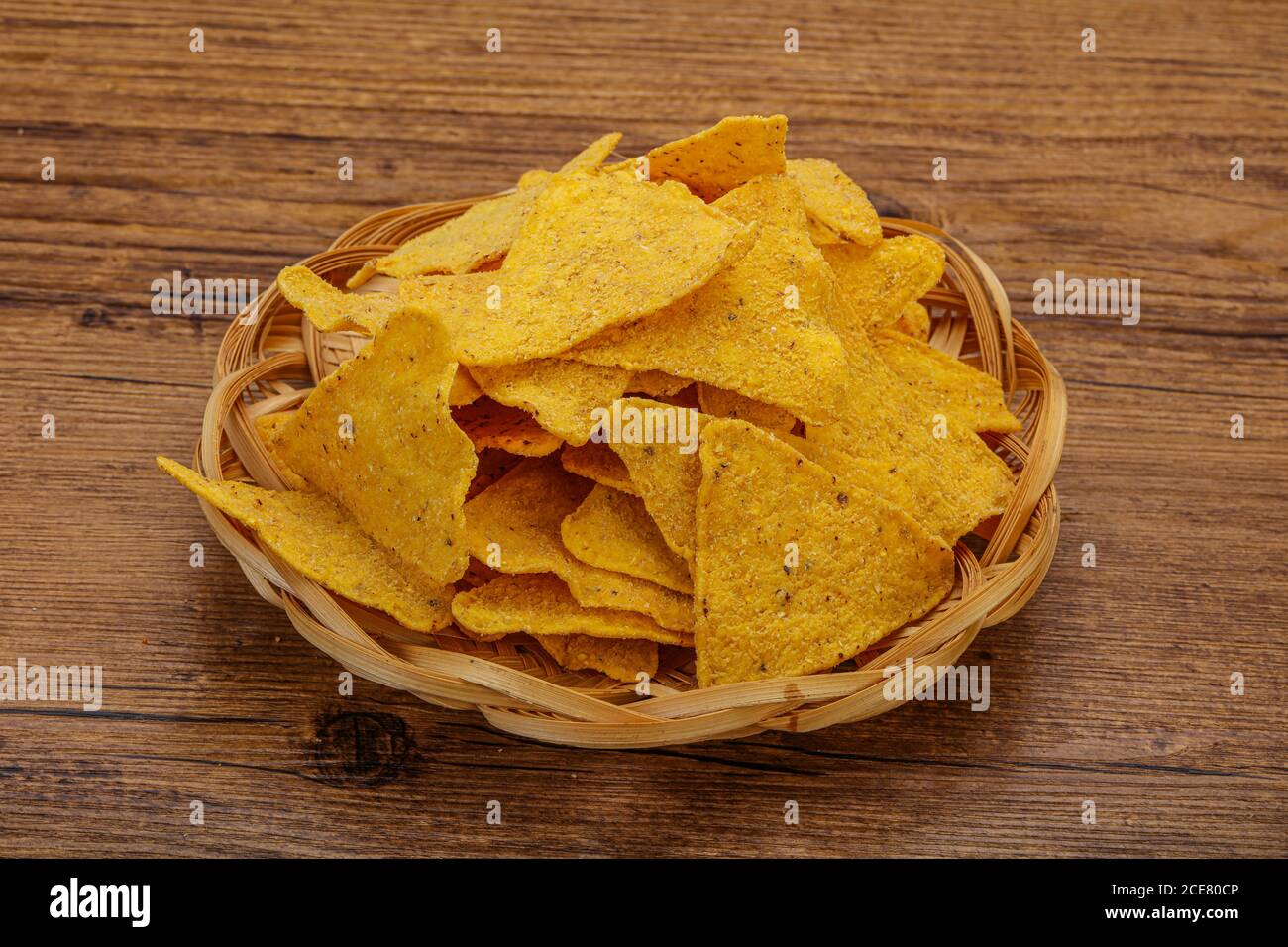 Mexican crunchy corn nachos triangle heap Stock Photo - Alamy