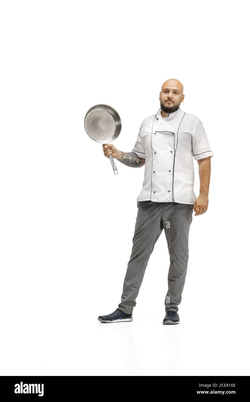 Portrait of a male chef cook, butcher isolated on a white studio ...