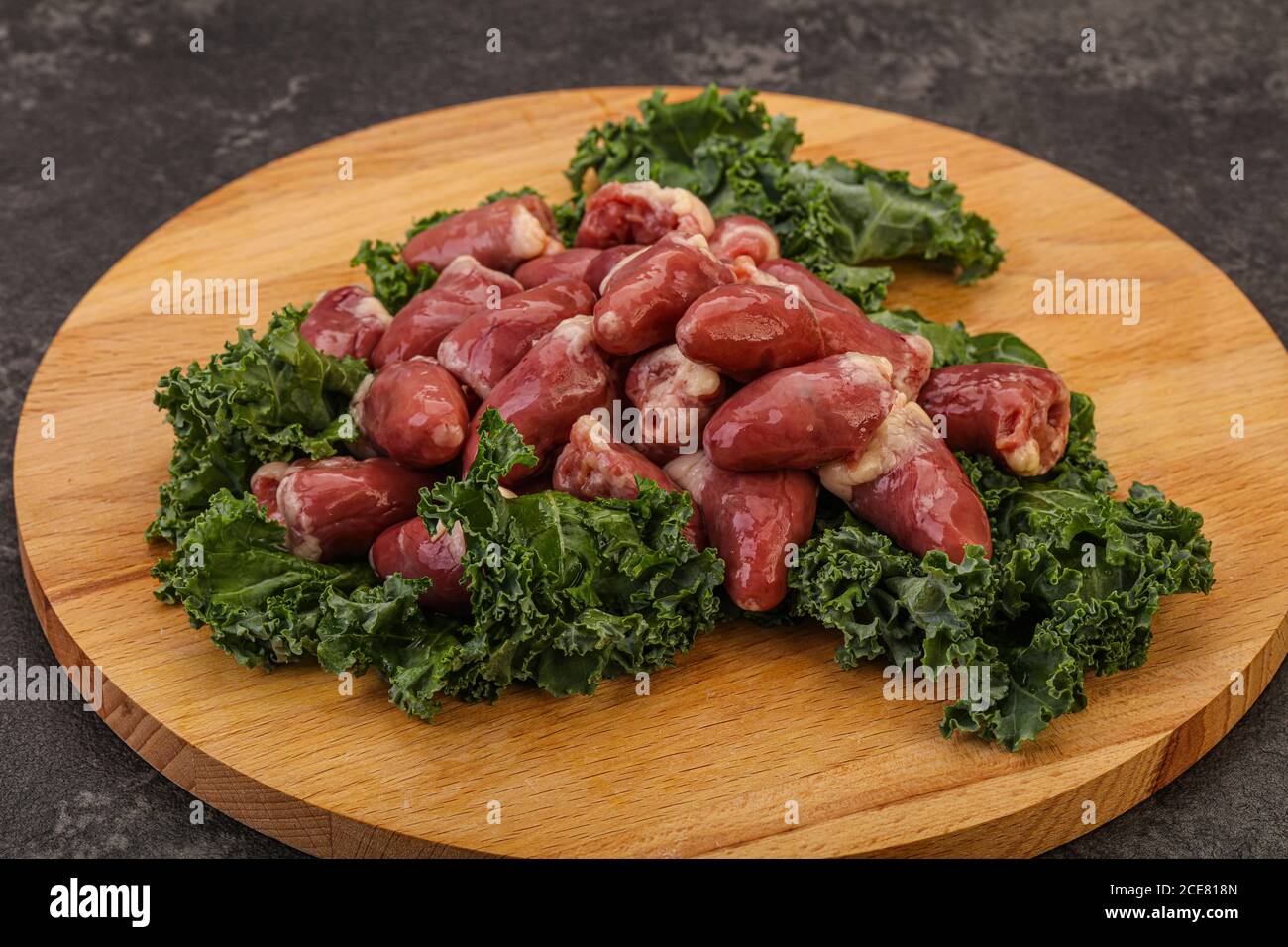 Raw chicken hearts heap for cooking Stock Photo - Alamy