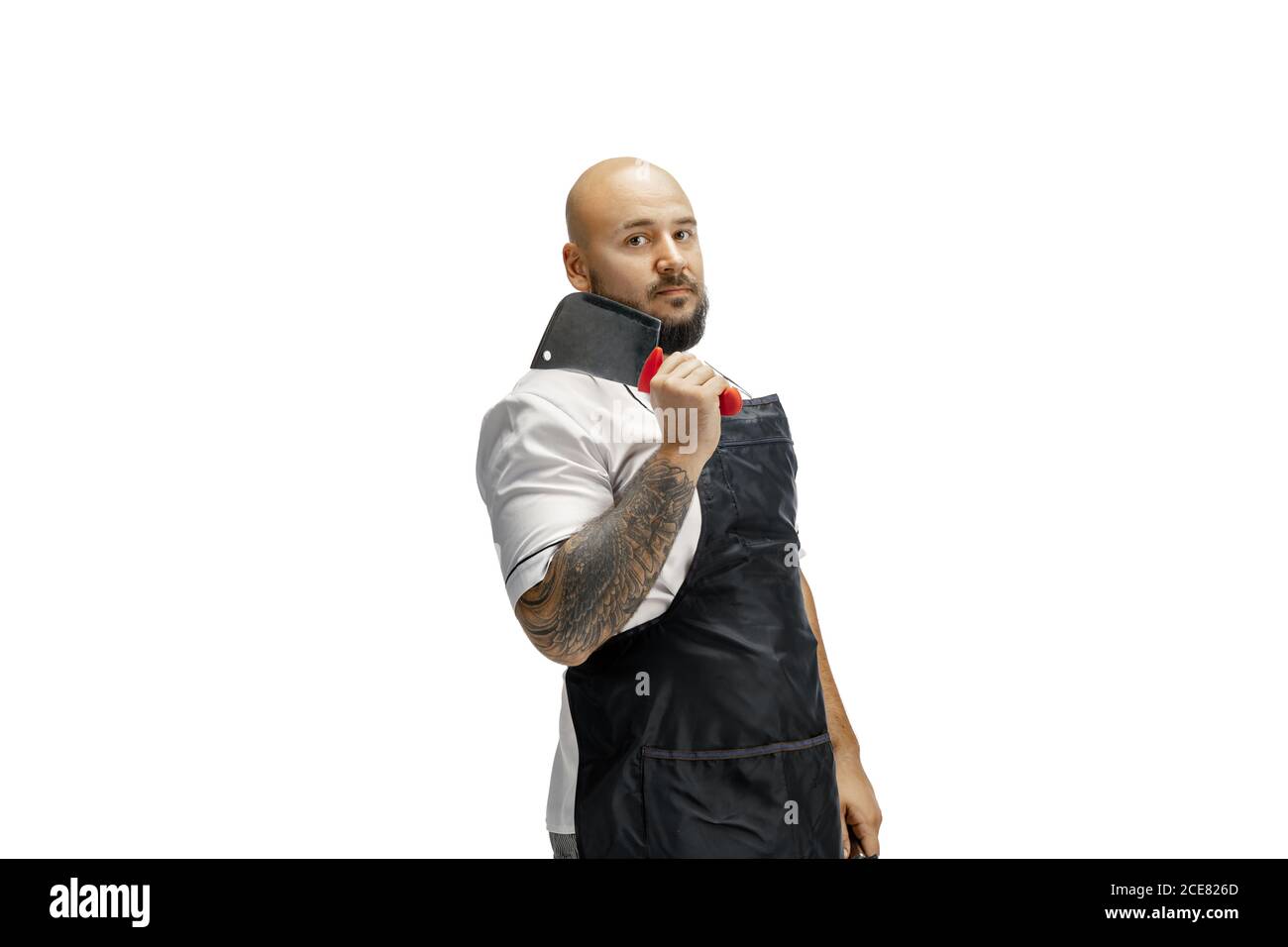 Portrait of a male chef cook, butcher isolated on a white studio ...