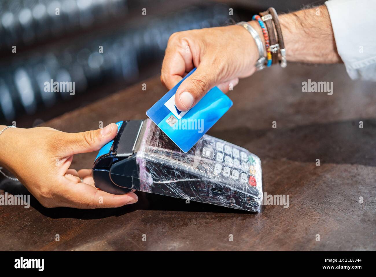 Pay at counter hi-res stock photography and images - Alamy