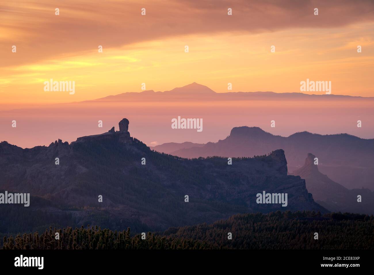 Magnificent view of mountain ridge under amazing sundown sky in evening ...