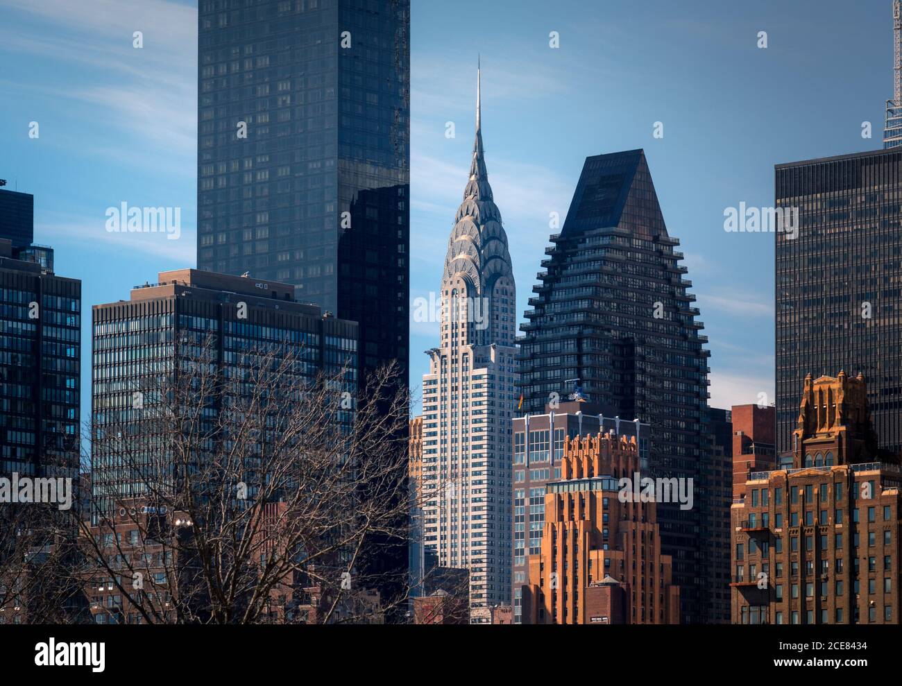 Modern city street with high buildings Stock Photo - Alamy