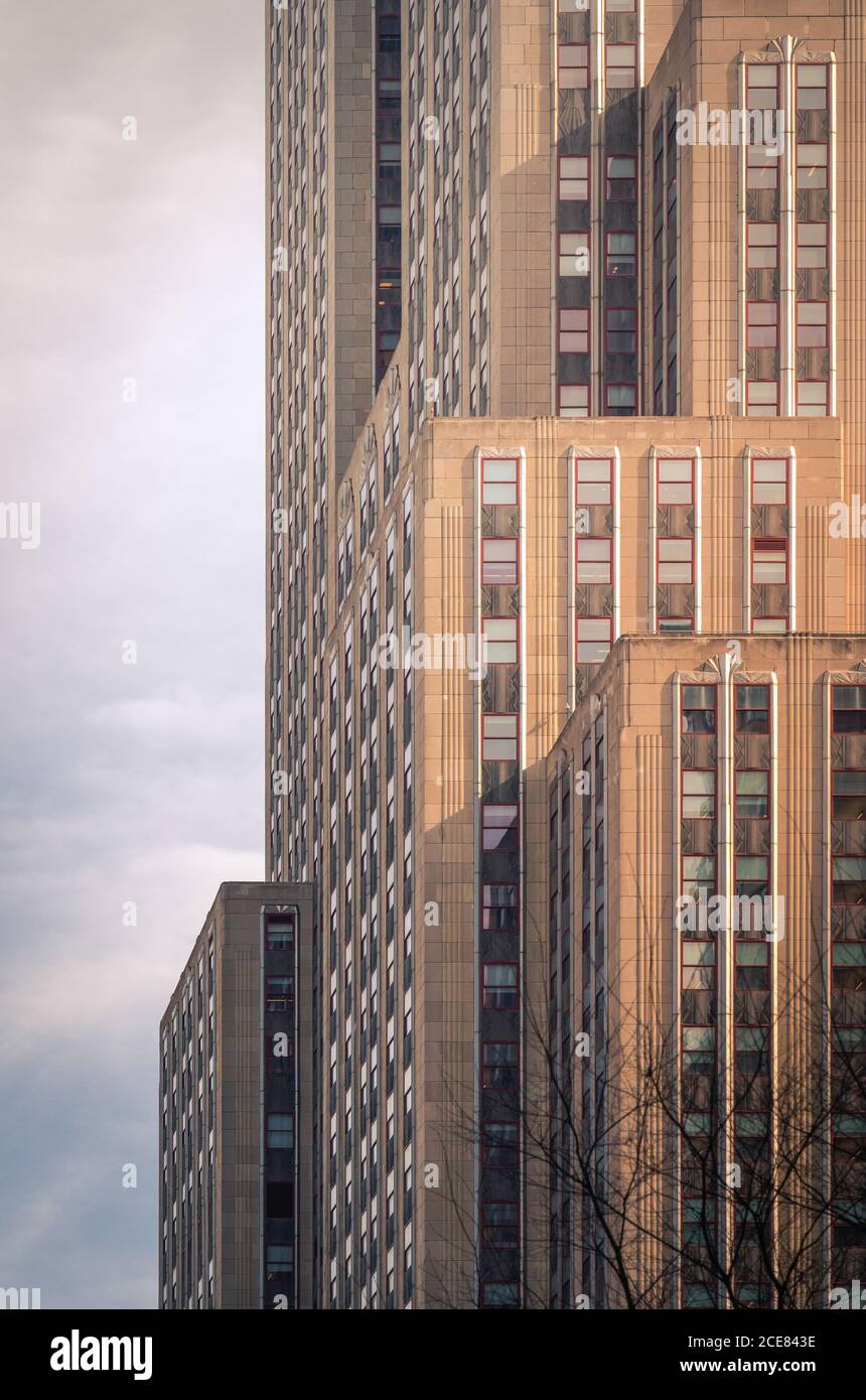 Low angle of tall commercial concrete building with modern architecture ...