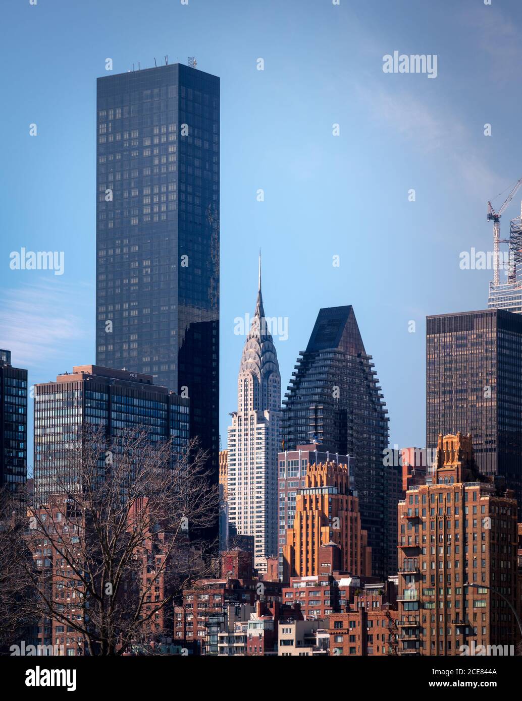 Modern city street with high buildings Stock Photo - Alamy