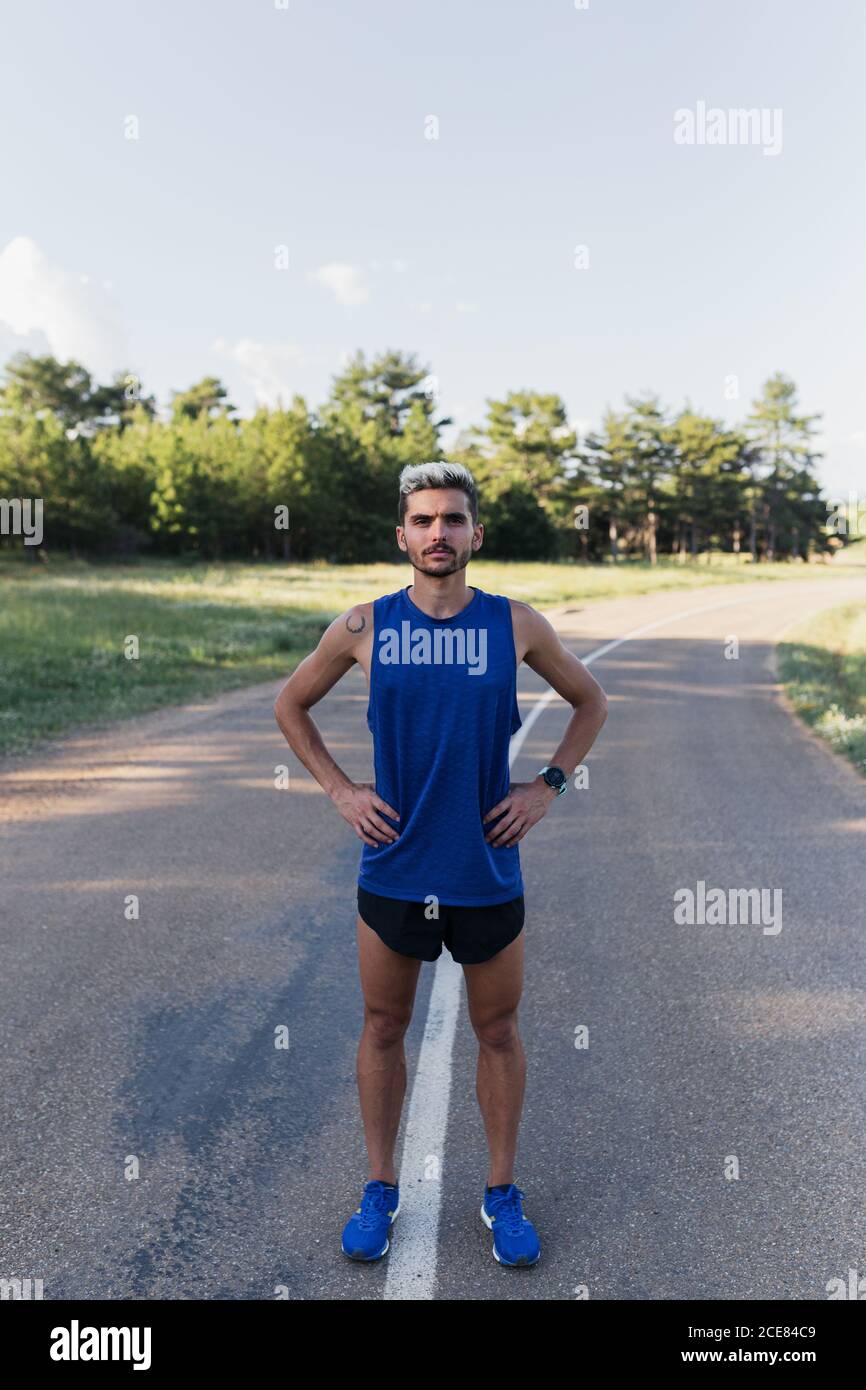 Man standing on road hi-res stock photography and images - Alamy