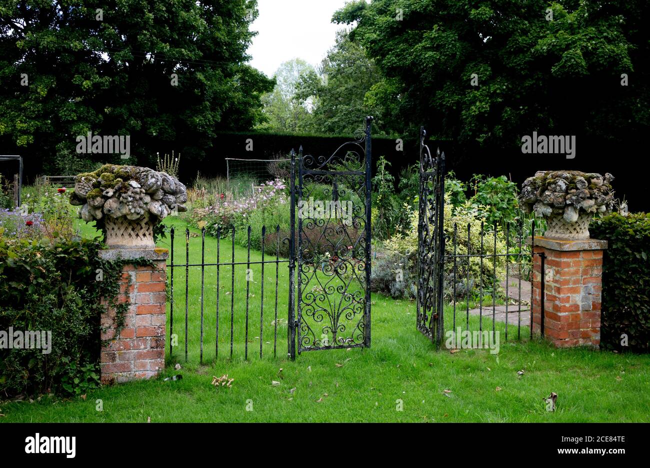 Gateway to gardens at Idlicote, Warwickshire, England, UK Stock Photo ...