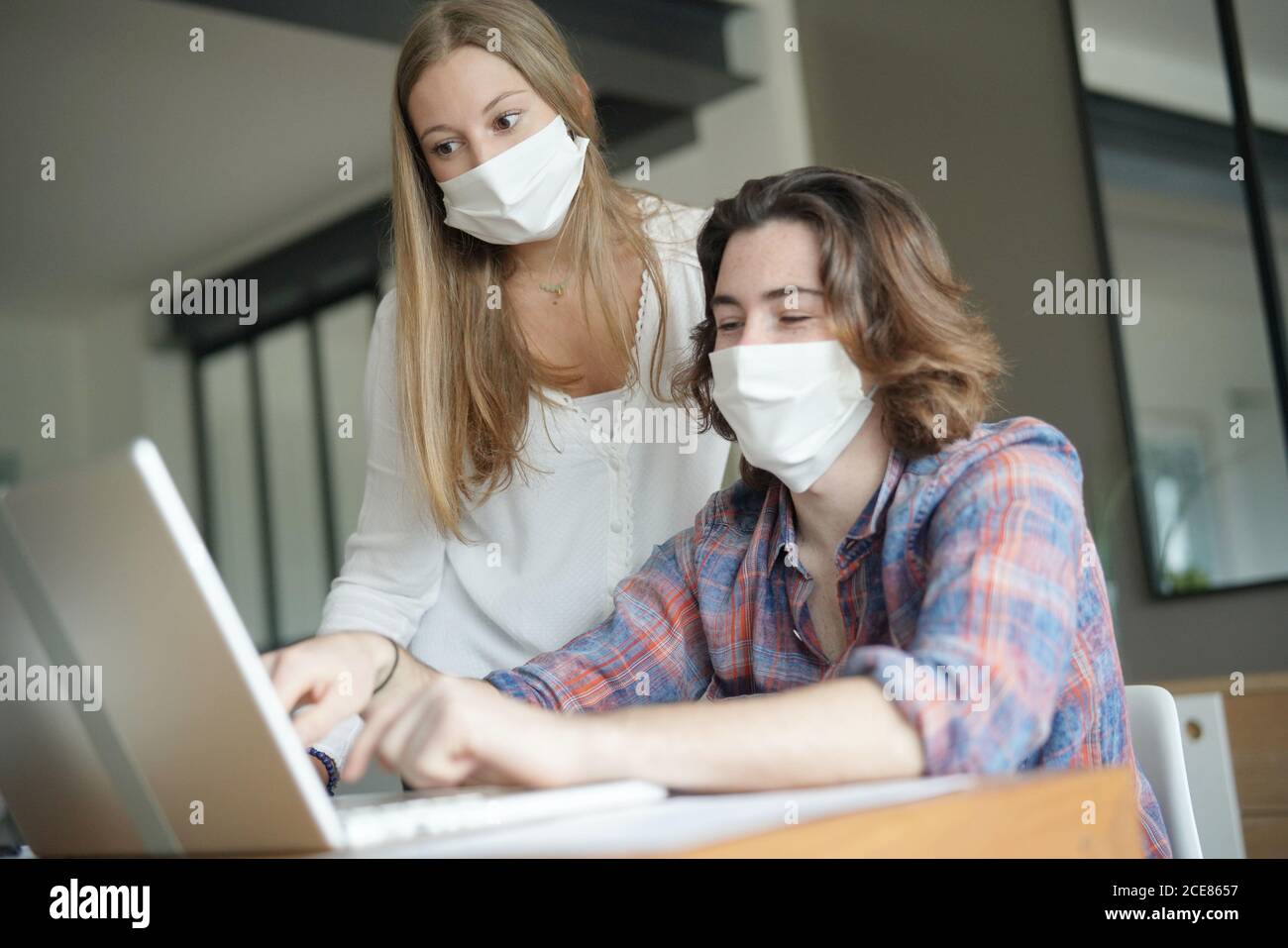 group of students working wearing masks Stock Photo - Alamy