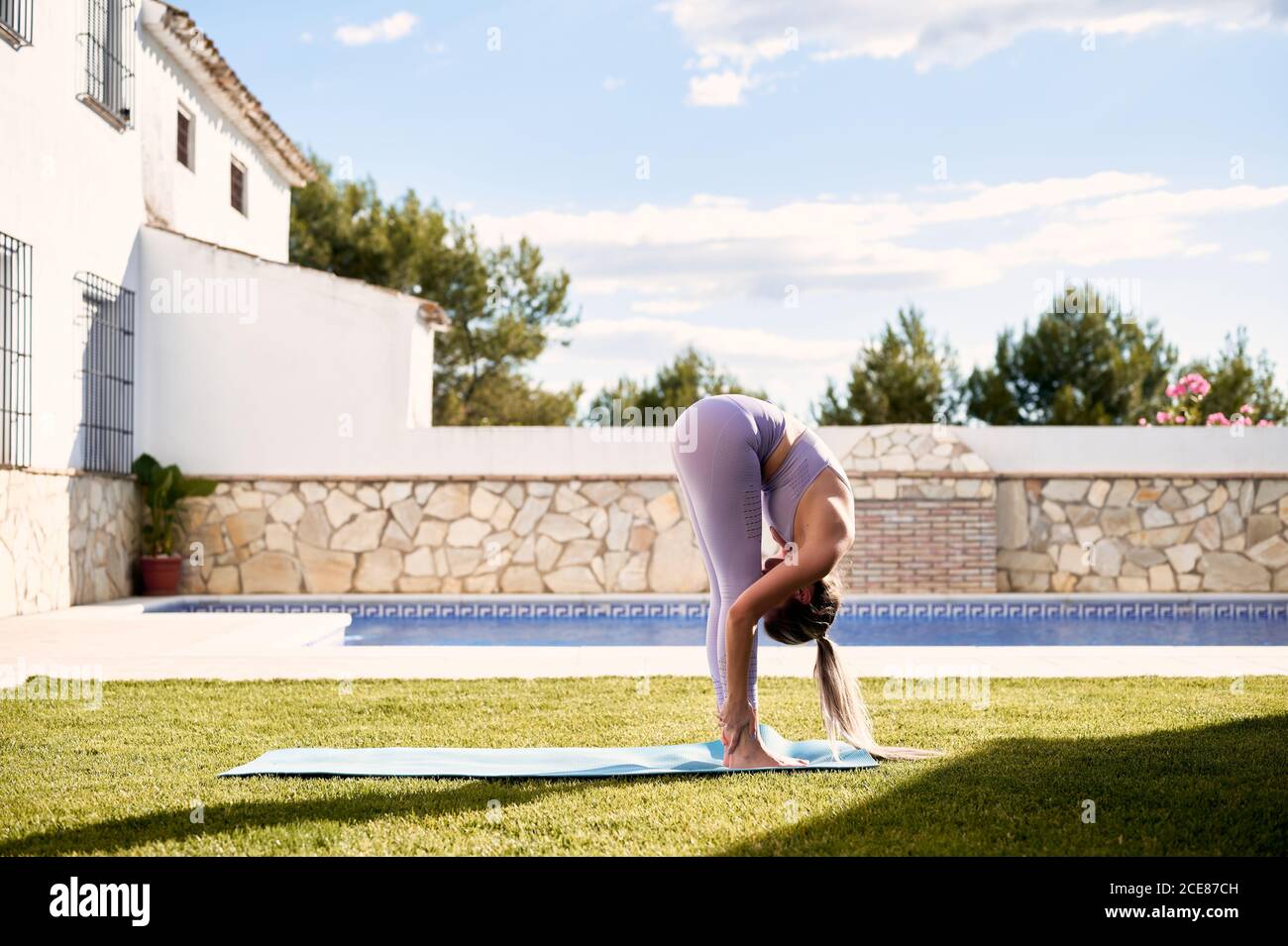 Standing Forward Bend Pose High Resolution Stock Photography and Images ...