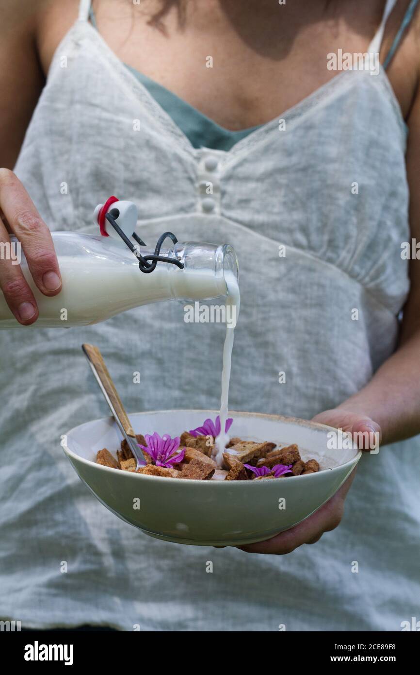 Adding milk cereal hi-res stock photography and images - Alamy