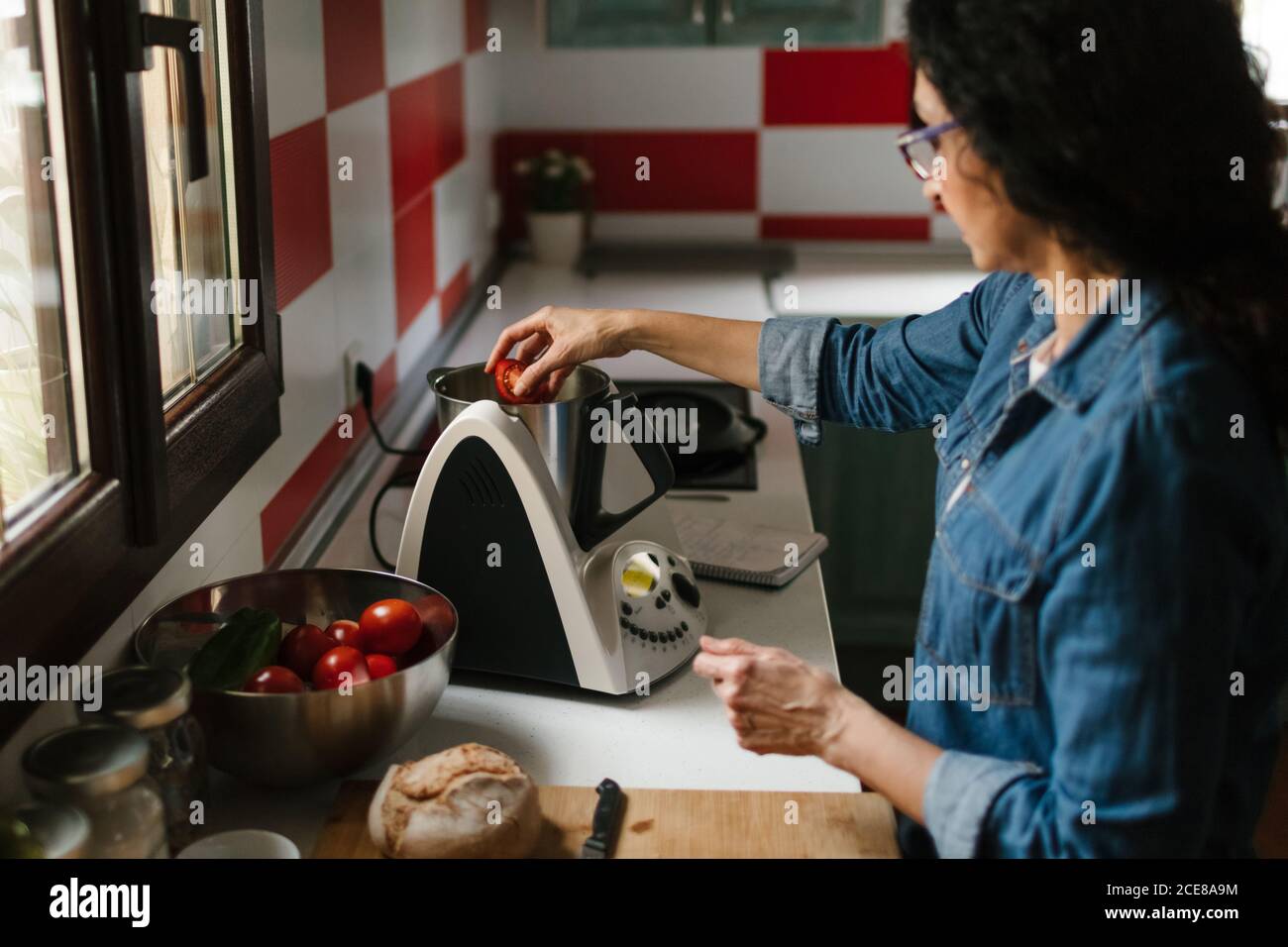 Woman cooking spanish food hi-res stock photography and images - Alamy