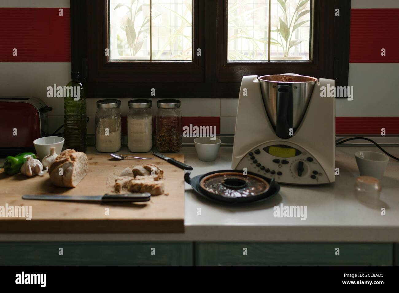 Front view of a kitchen with some ingredients and food in the ...