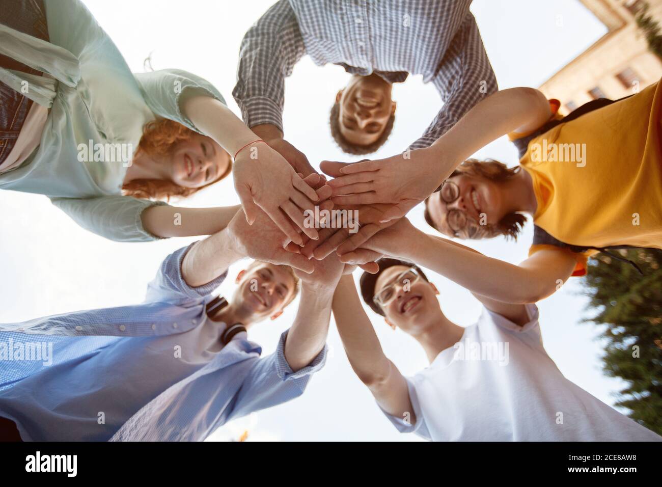Hold hands circle hi-res stock photography and images - Alamy