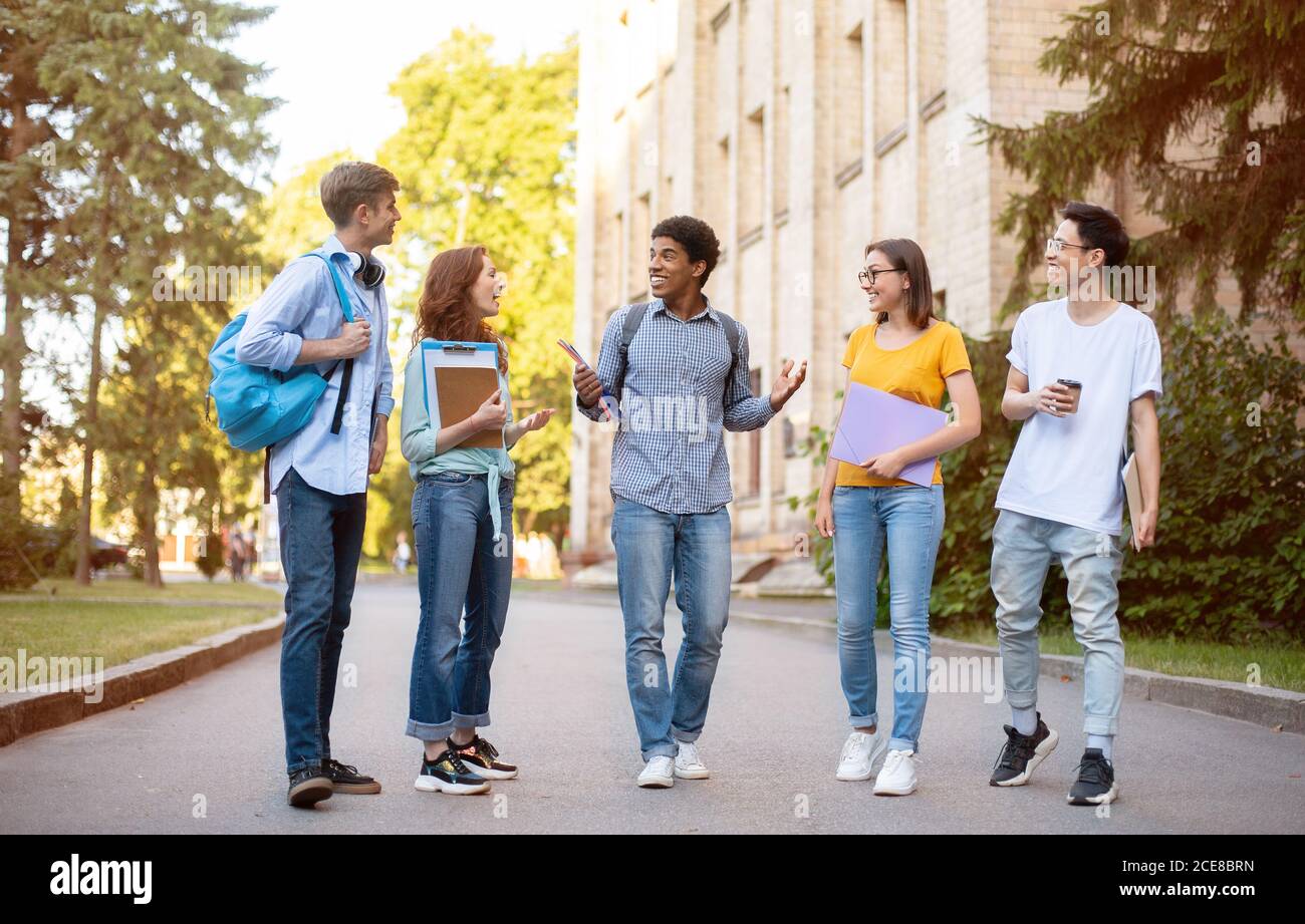 Students outside school happy talking hi-res stock photography and ...