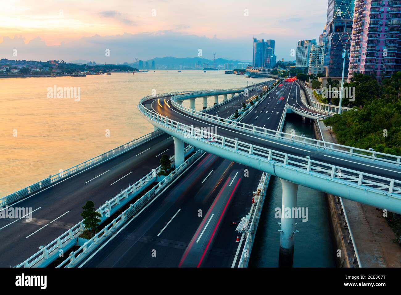 From above of modern elevated highway intersection with marking lines ...