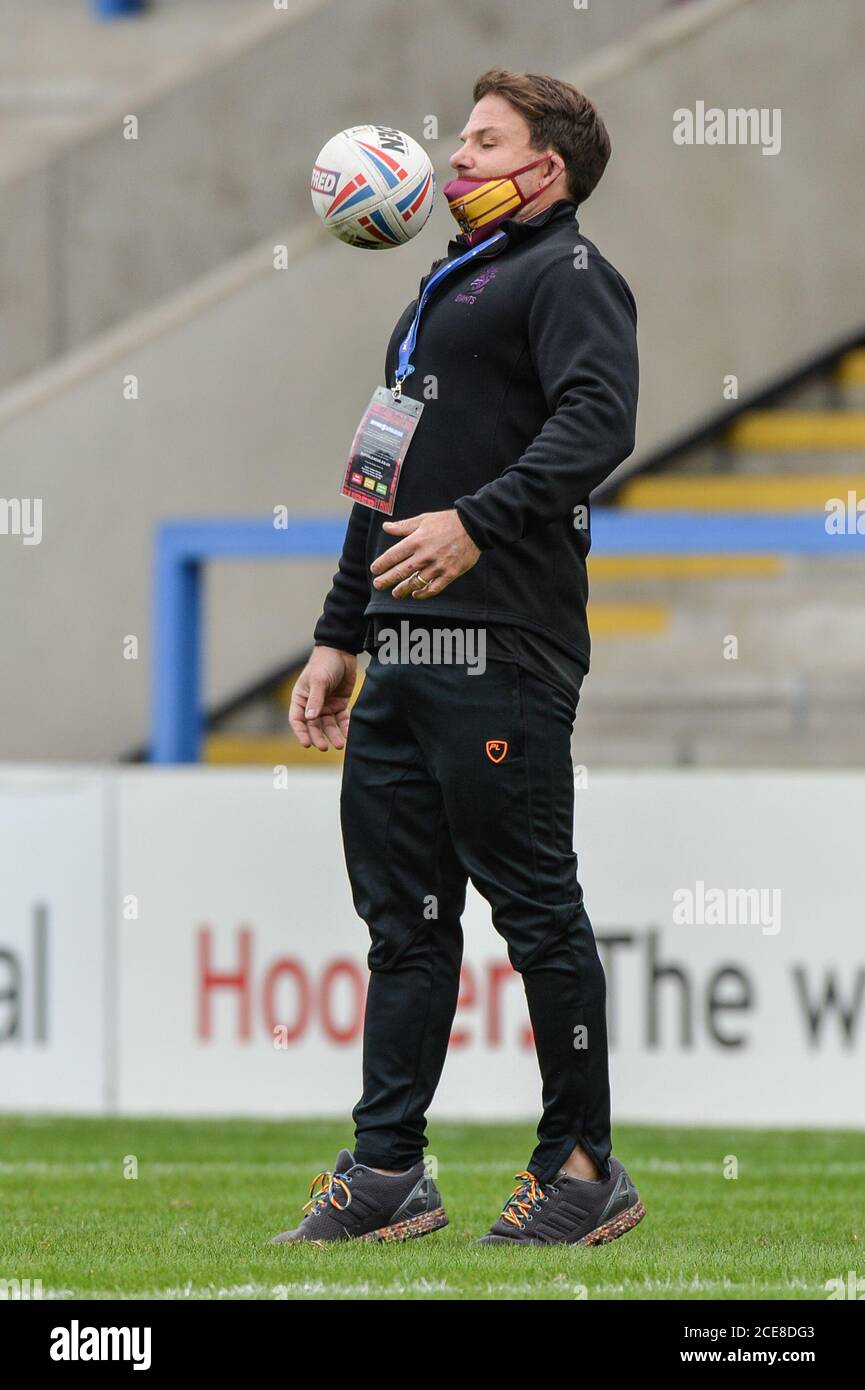 Huddersfield Giants Coach Simon Woolford practices kick ups Stock Photo ...