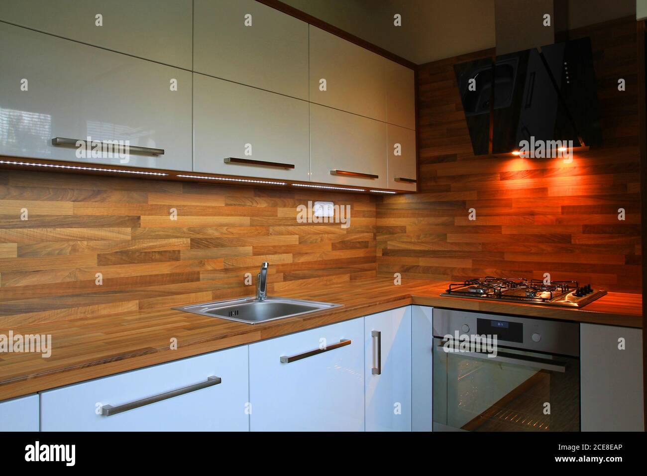 modern kitchen interior (white color and wooden texture Stock Photo - Alamy