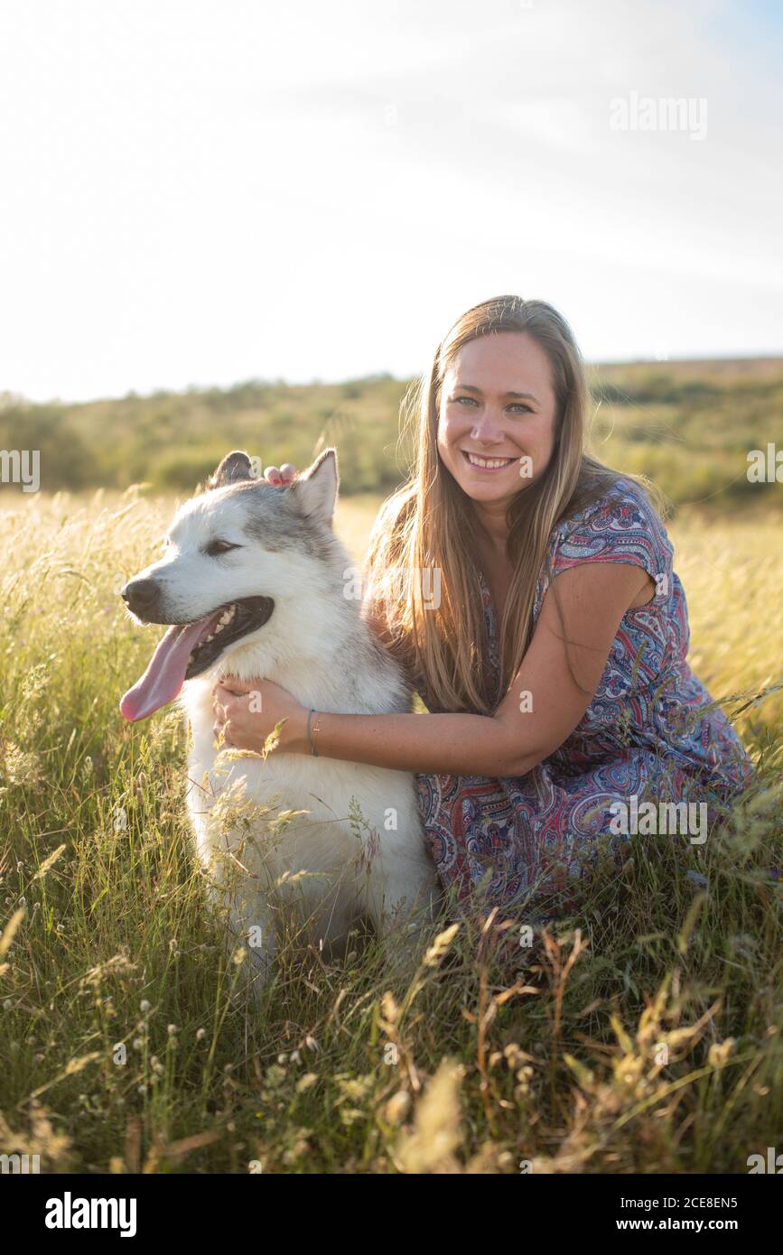 Woman relaxing alaskan malamute hi-res stock photography and images - Alamy