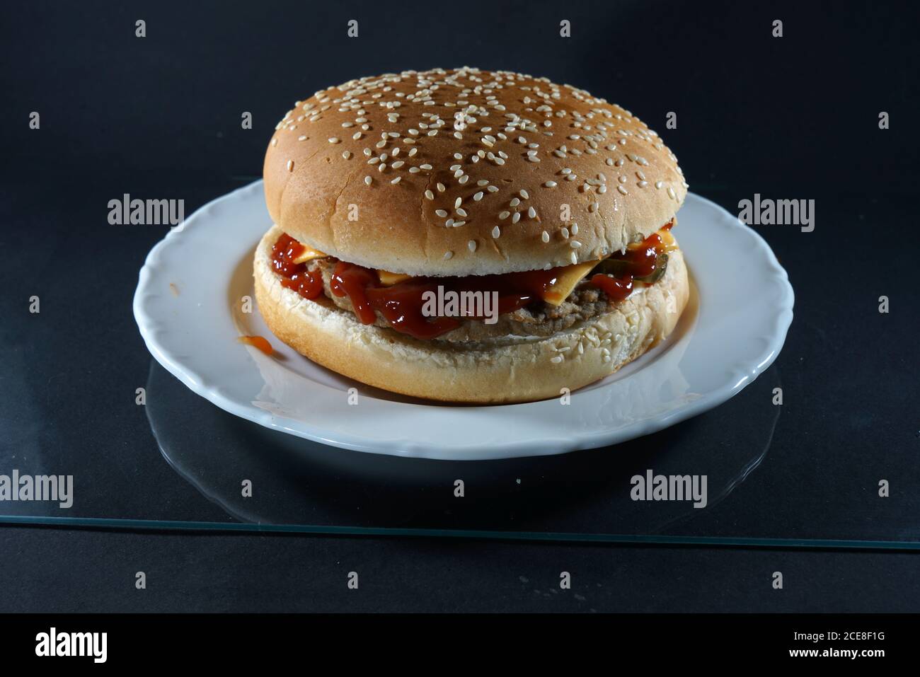 Tasty homemade hamburger on a plate Stock Photo - Alamy
