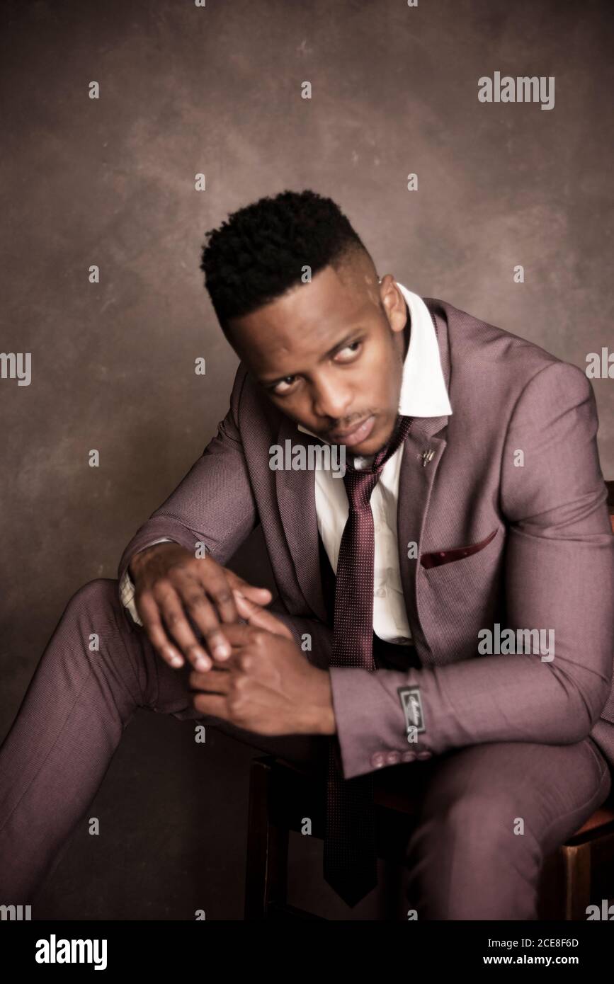 african stock photo of black gentlemen in smart clothes in studio ...