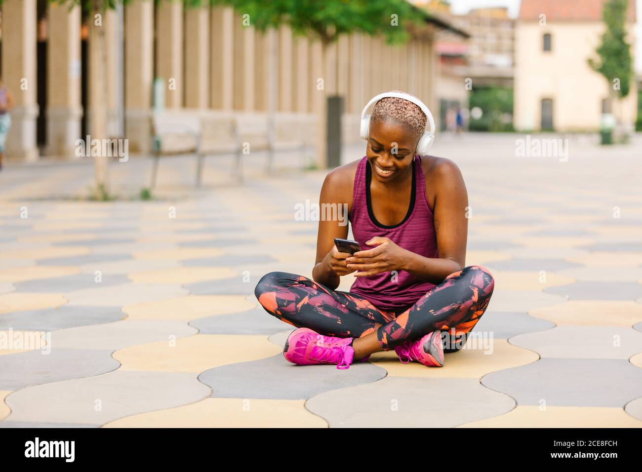 African woman sitting forward hi-res stock photography and images - Alamy