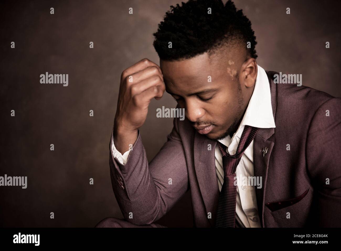 african stock photo of black gentlemen in smart clothes in studio ...
