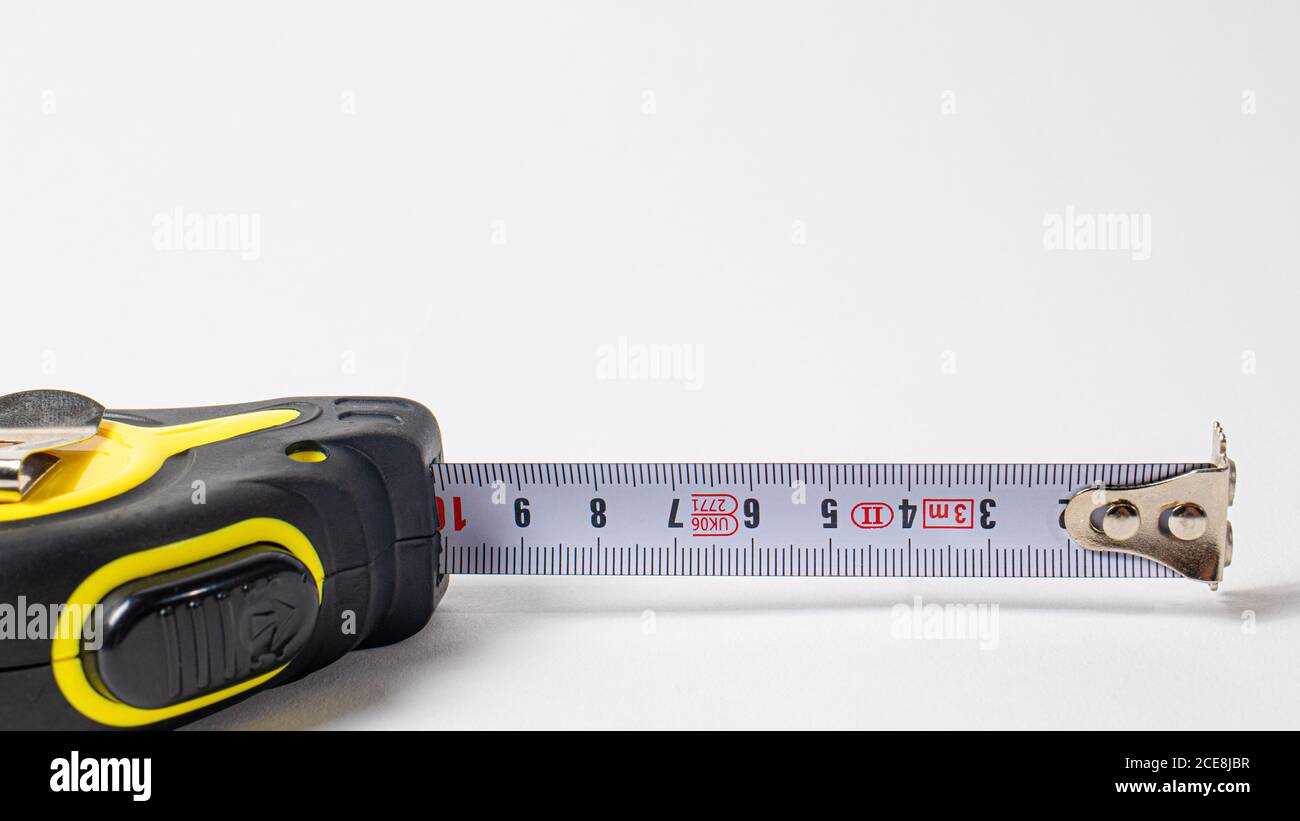 Measuring roulette yellow black on a white background banner with space ...