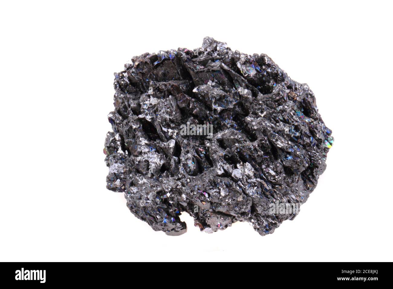 synthetic corundum mineral (look like meteor) isolated on the white ...