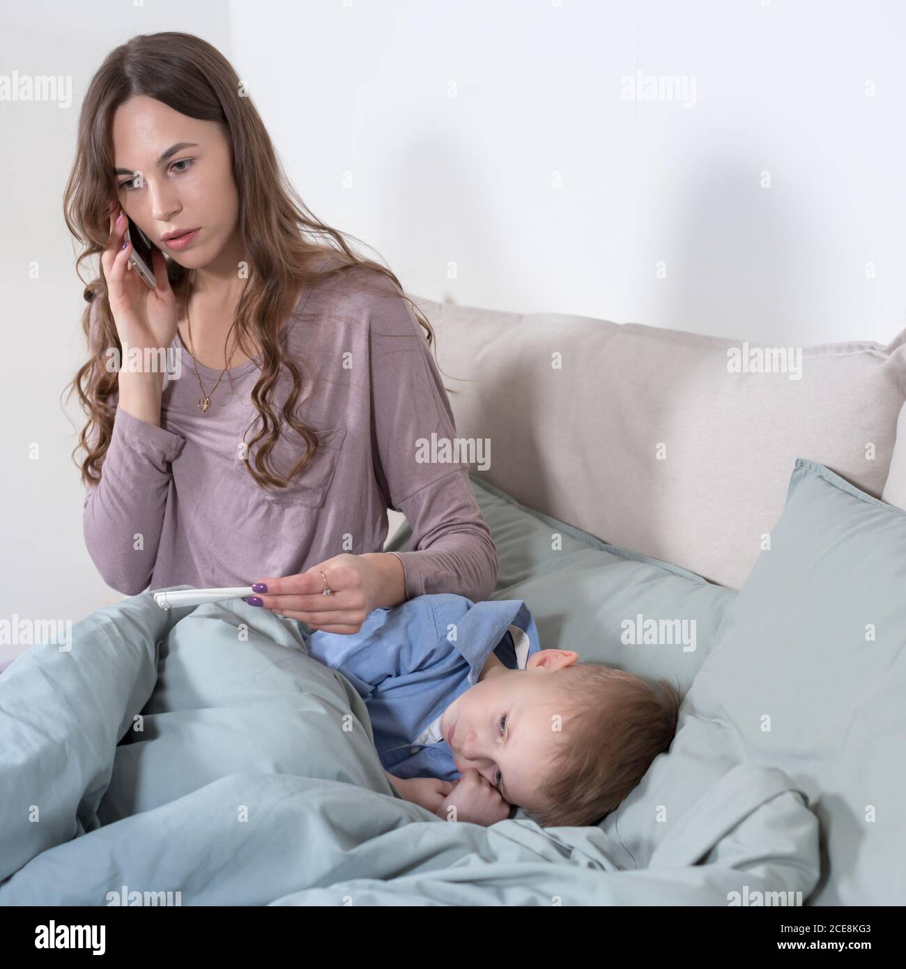 Worried parent sick child hi-res stock photography and images - Alamy