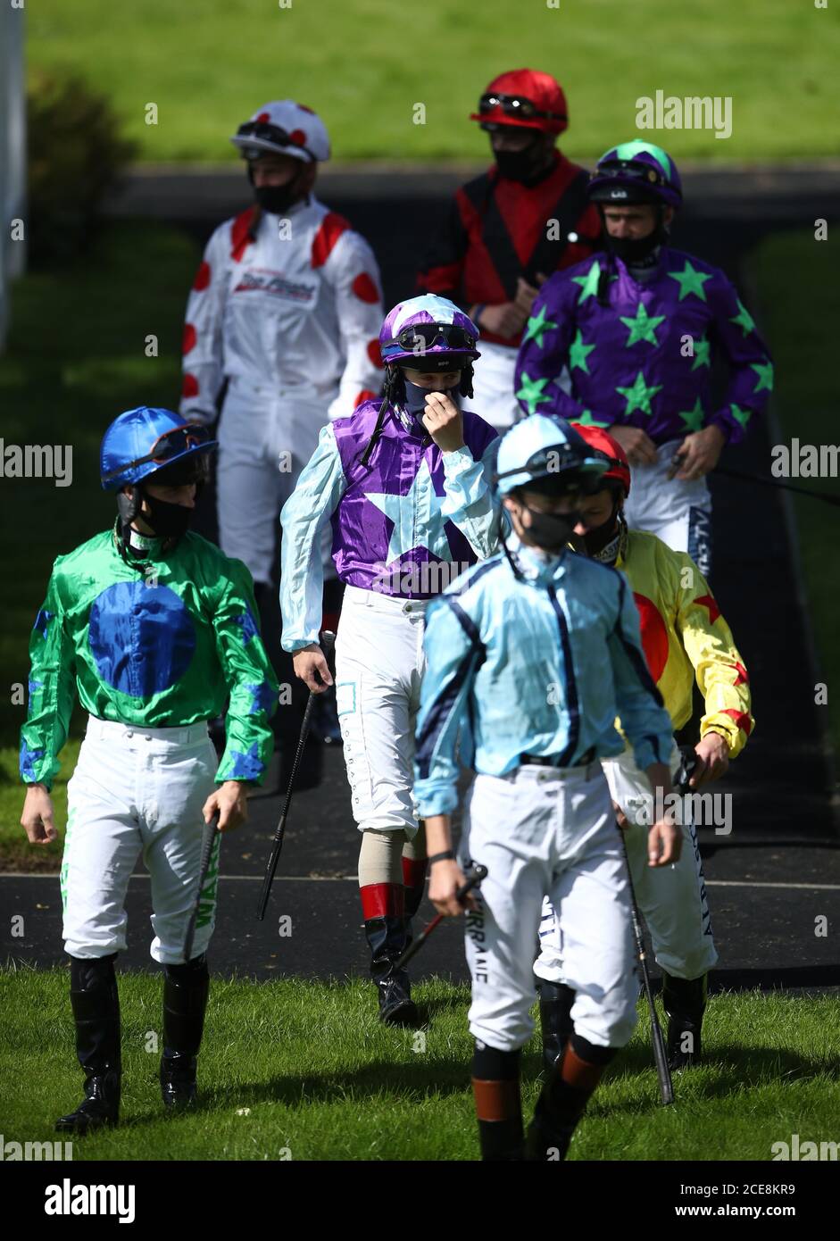 Jockey Robert Downey (centre, purple and blue silks) prior to The Ripon ...