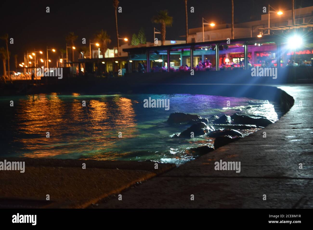 Τα Μπάνια restaurant and harbour in Paphos, Cyprus, by night, with ...