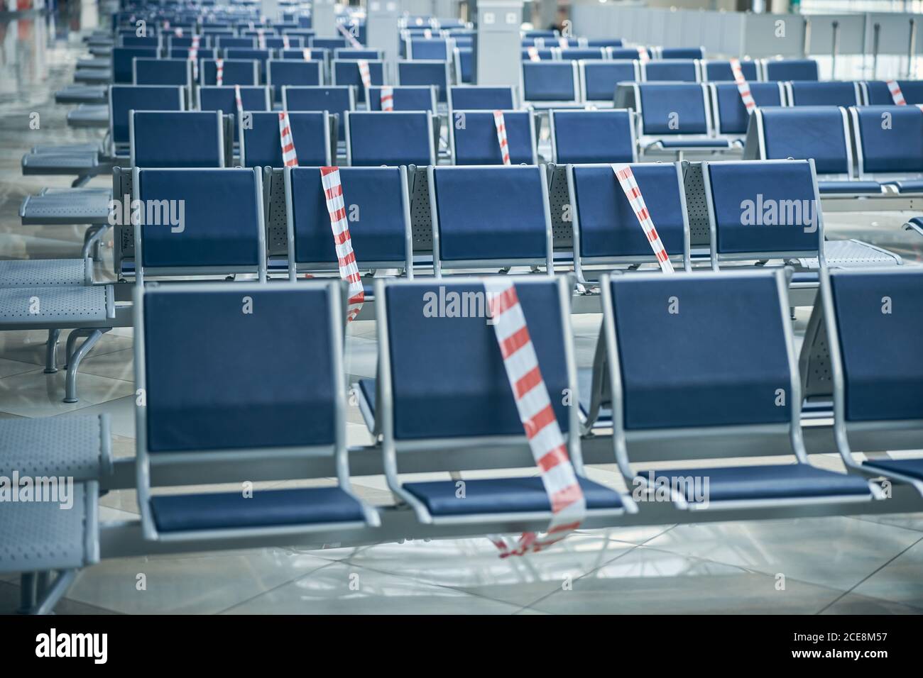Empty airport terminal waiting area with chairs Stock Photo - Alamy