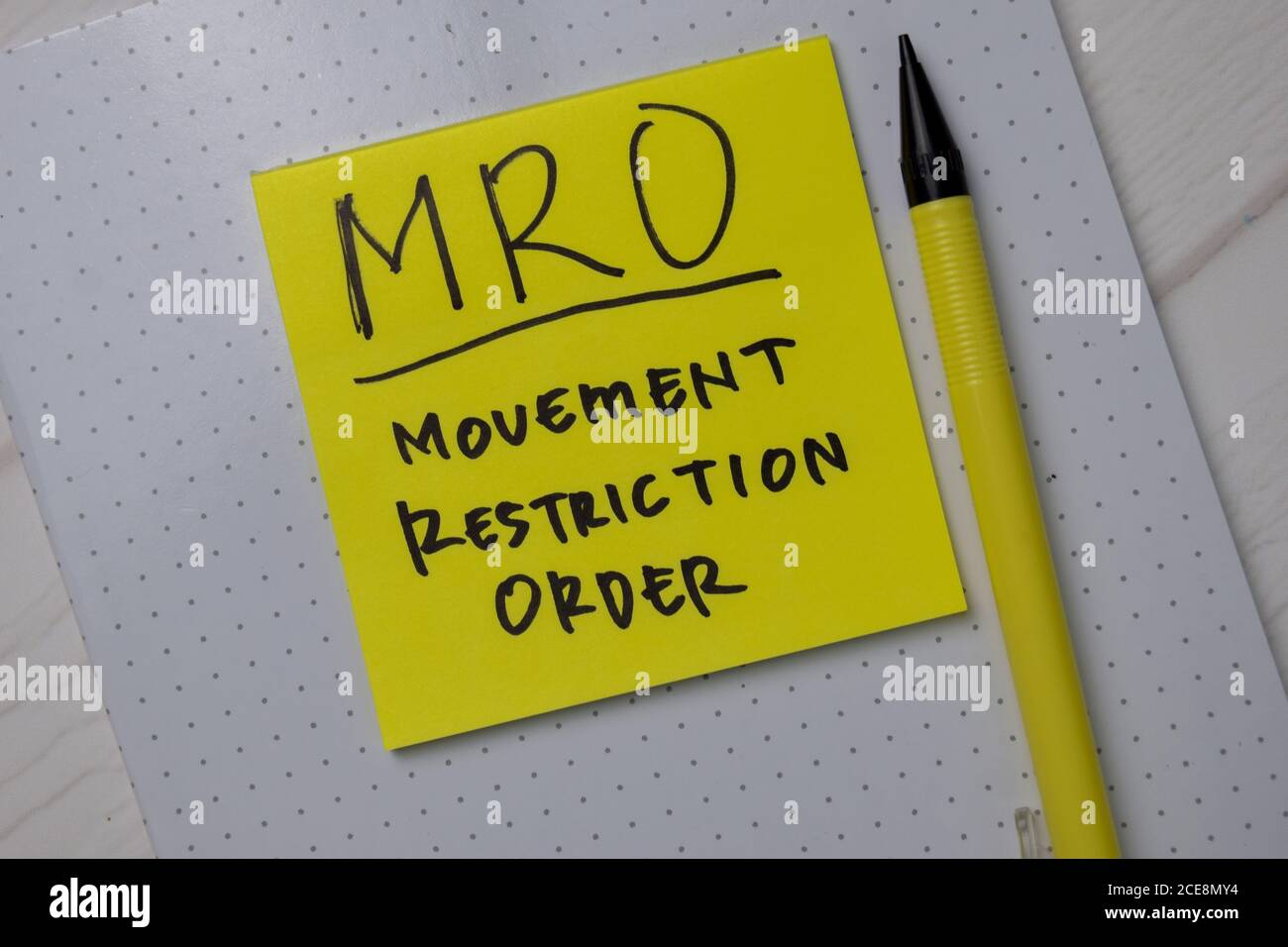 MRO - Movement Restriction Order write on sticky notes isolated on ...