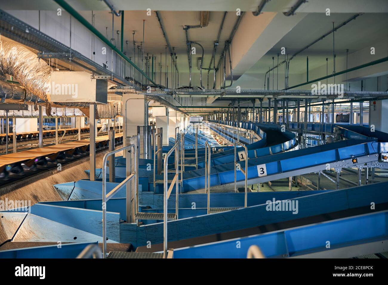 Photo of baggage sorting stations with conveyor belts Stock Photo - Alamy