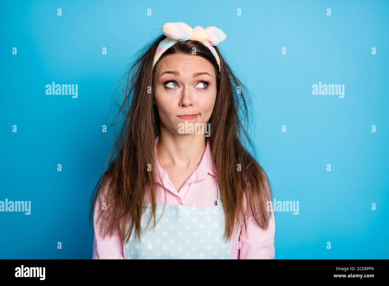 Close-up portrait of nice attractive minded creative maid chef ...
