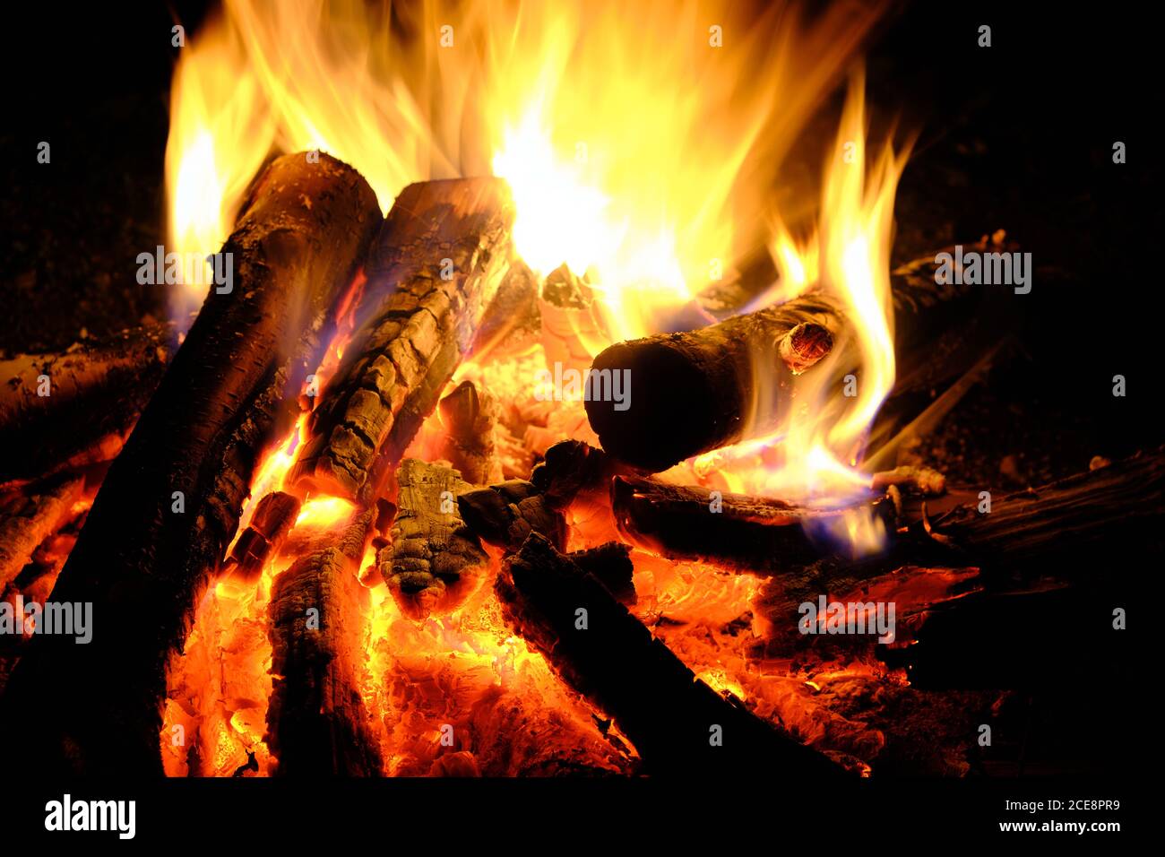 Fire was lit, hot coals in the fire from the burning logs Stock Photo ...