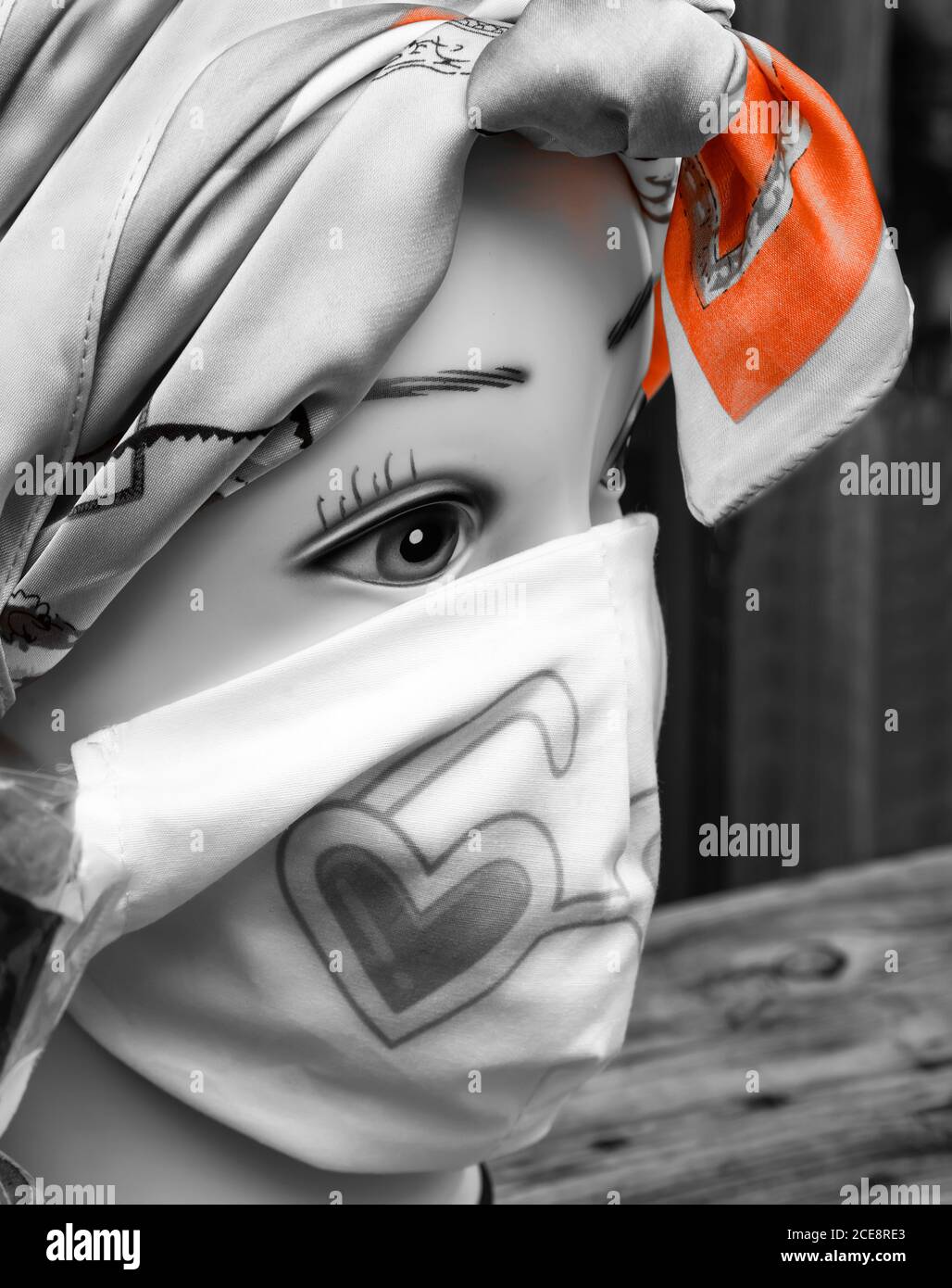 Self-made mask on the face of a mannequin to protect against virus and ...