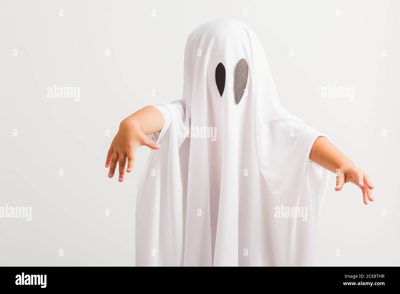 Funny Halloween Kid Concept, little cute child with white dressed ...