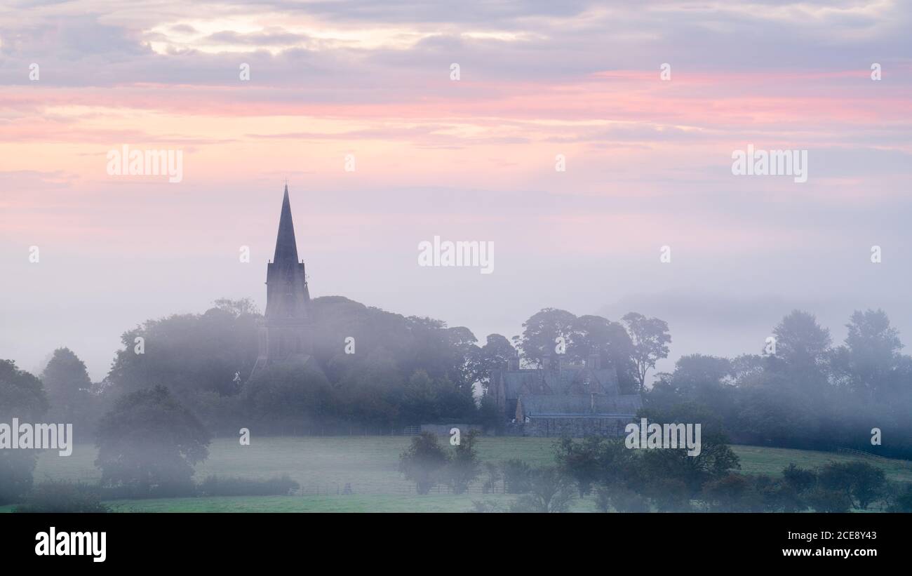The steeple of St Barnabas Church in Weeton, Lower Wharfedale, is ...
