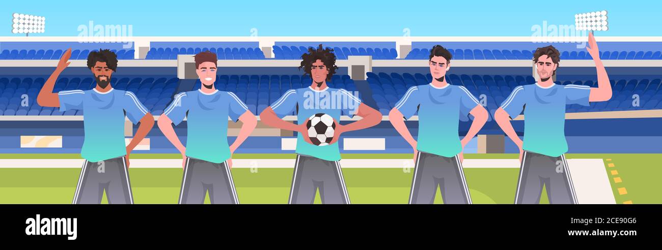 mix race footbal players standing together on stadium soccer team ready ...