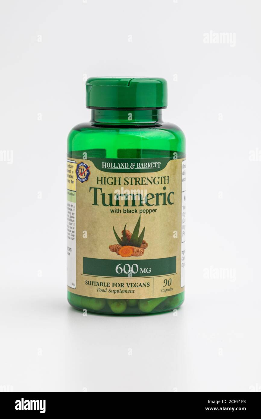 A bottle of Turmeric capsules Stock Photo - Alamy